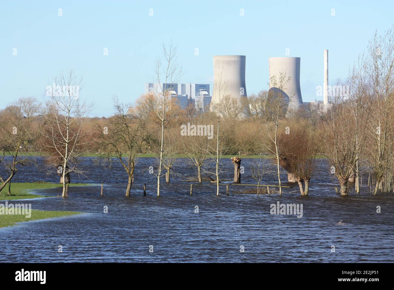 Lake in an industrial area with factories in the background Stock Photo ...
