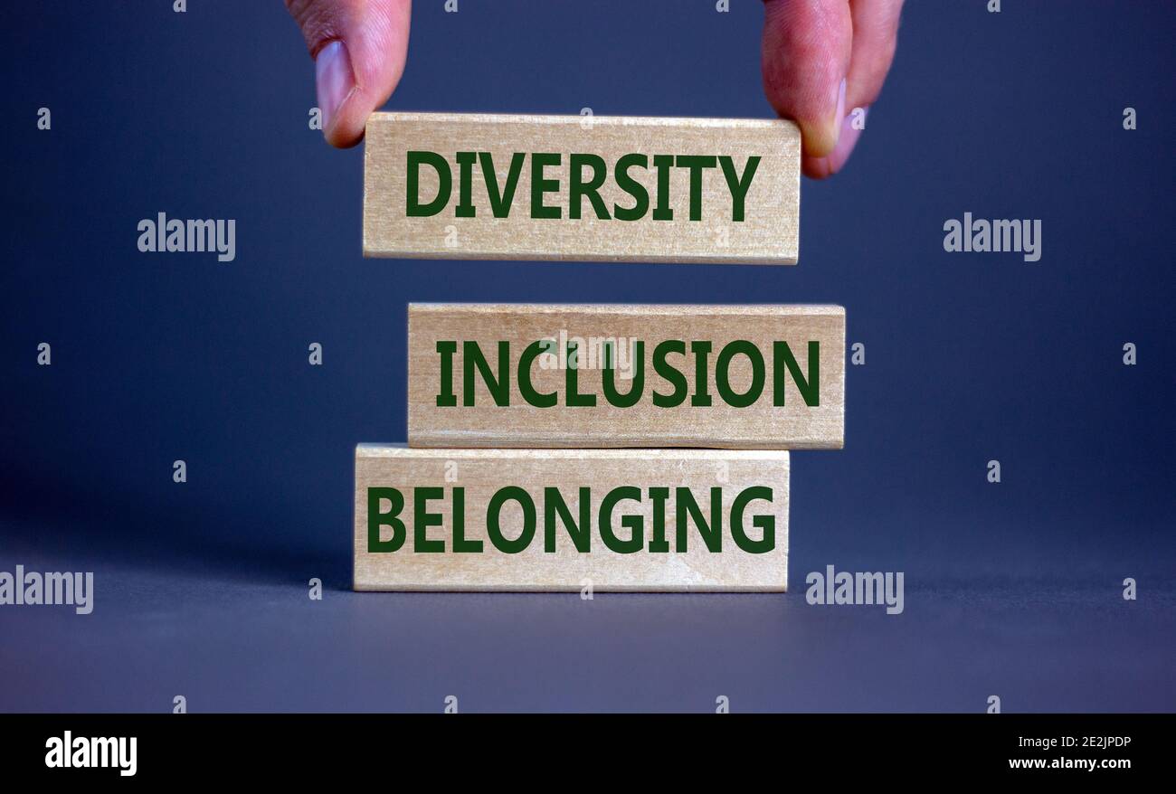 Diversity, inclusion and belonging symbol. Wooden blocks with words ...