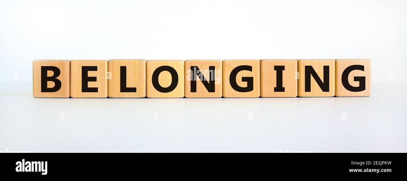 Belonging and better inclusion symbol. Belonging word on wooden cubes ...
