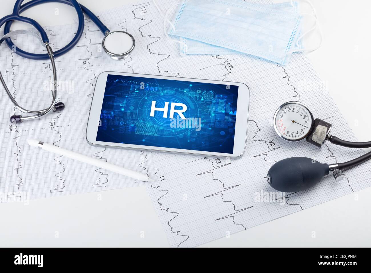 Close-up view of a tablet pc with HR abbreviation, medical concept ...