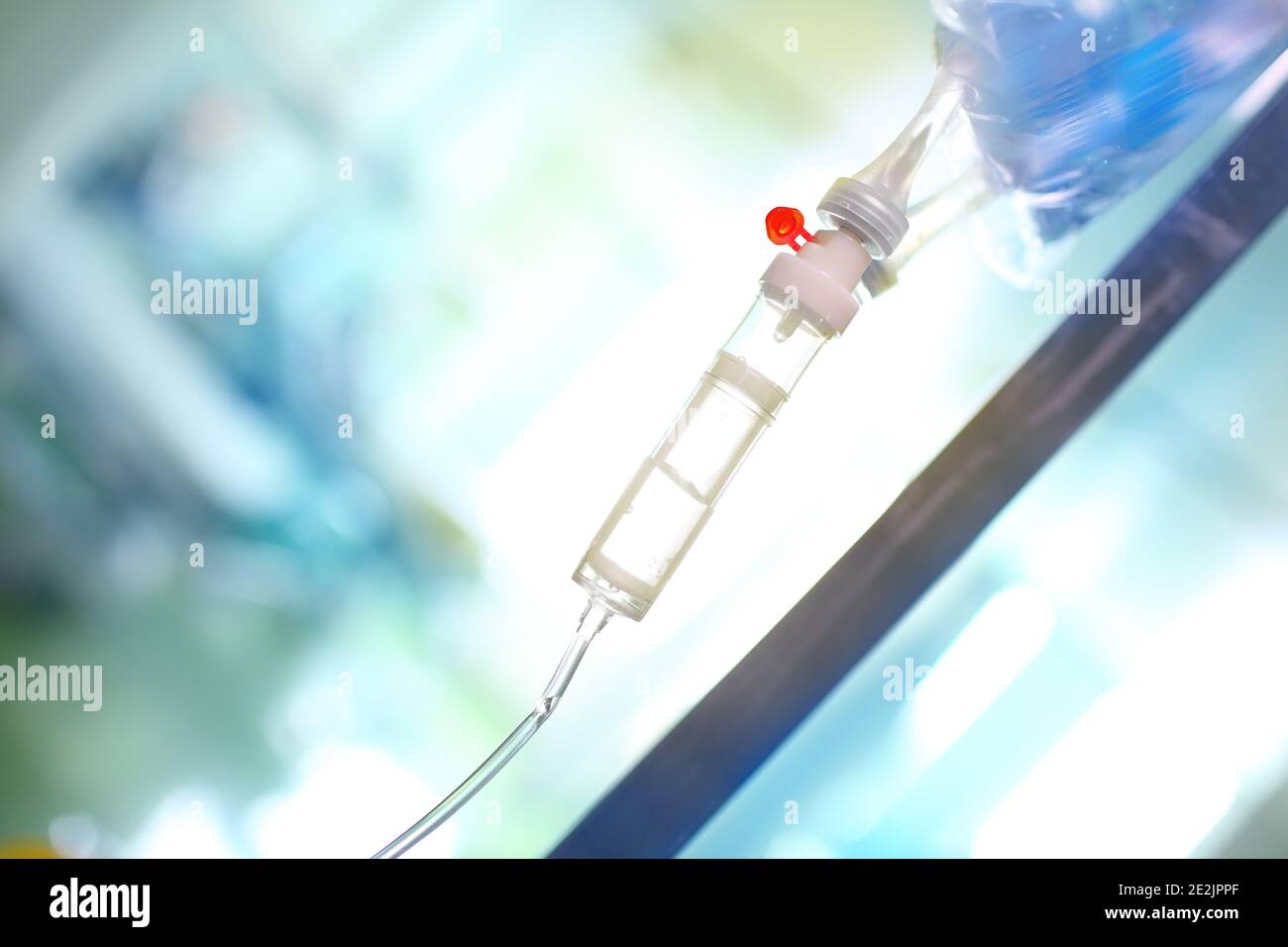Intravenous drip system on the blurred background Stock Photo - Alamy