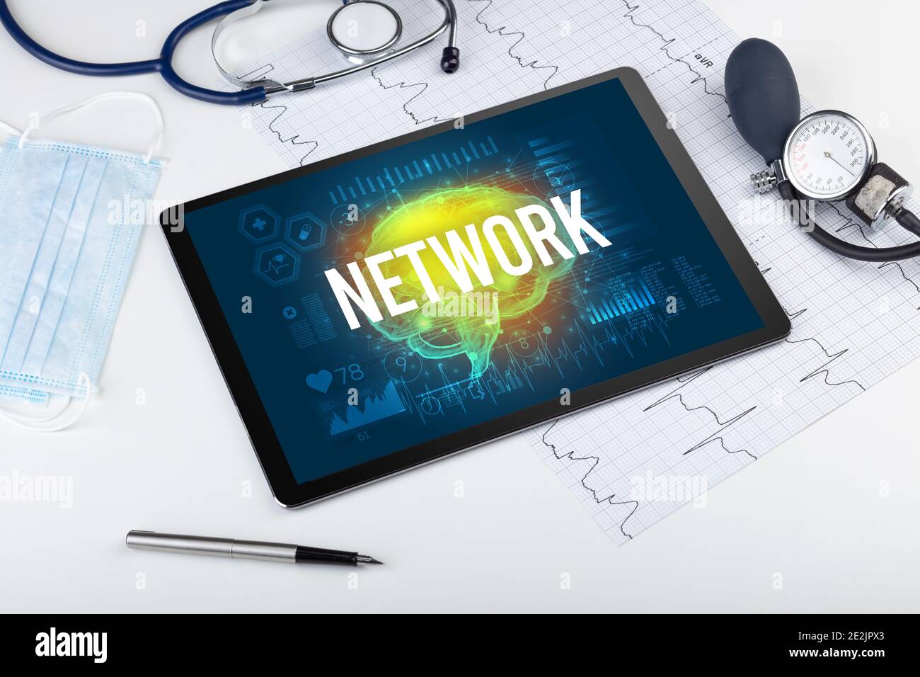 Tablet pc and medical tools with NETWORK inscription, social distancing ...