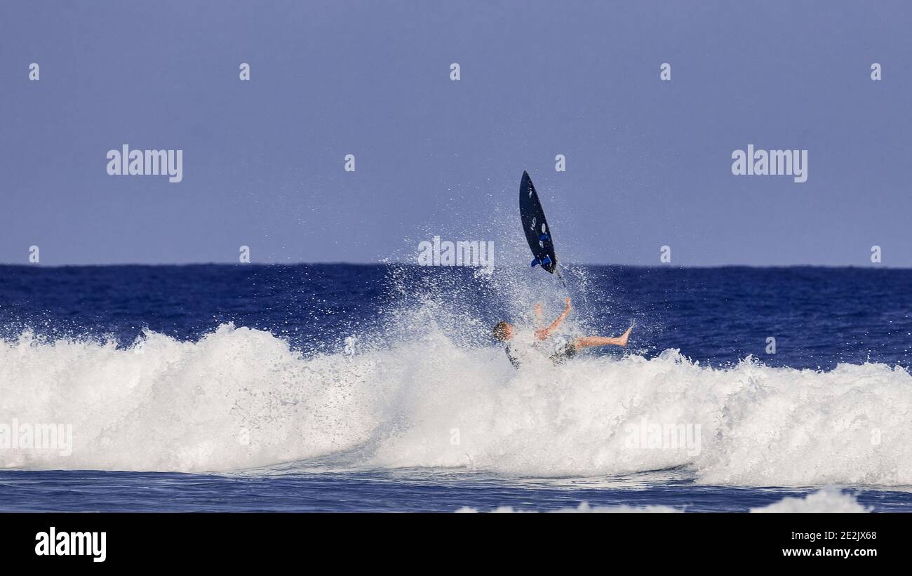 surfing board in the air After a surfer falls into the water. Water ...