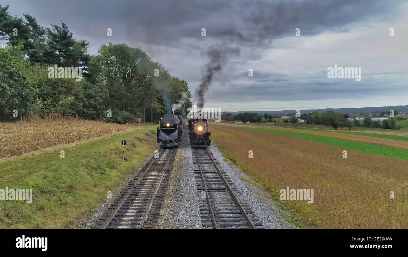 Aerial View of 2 Restored Antique Steam Engines and Passenger Cars ...
