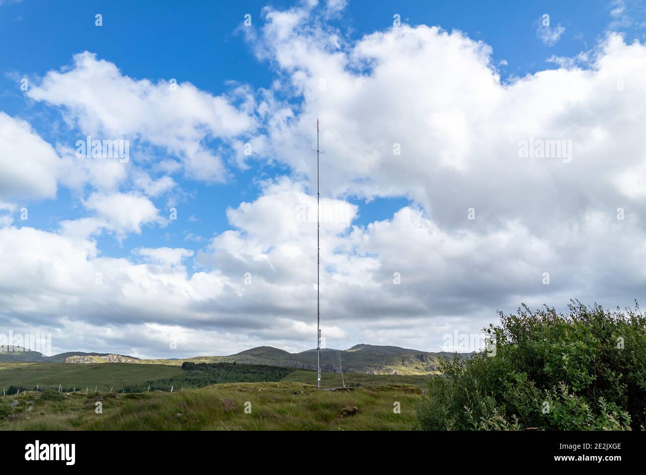 Street view of transmitter tower on an agricultural field in the irish ...