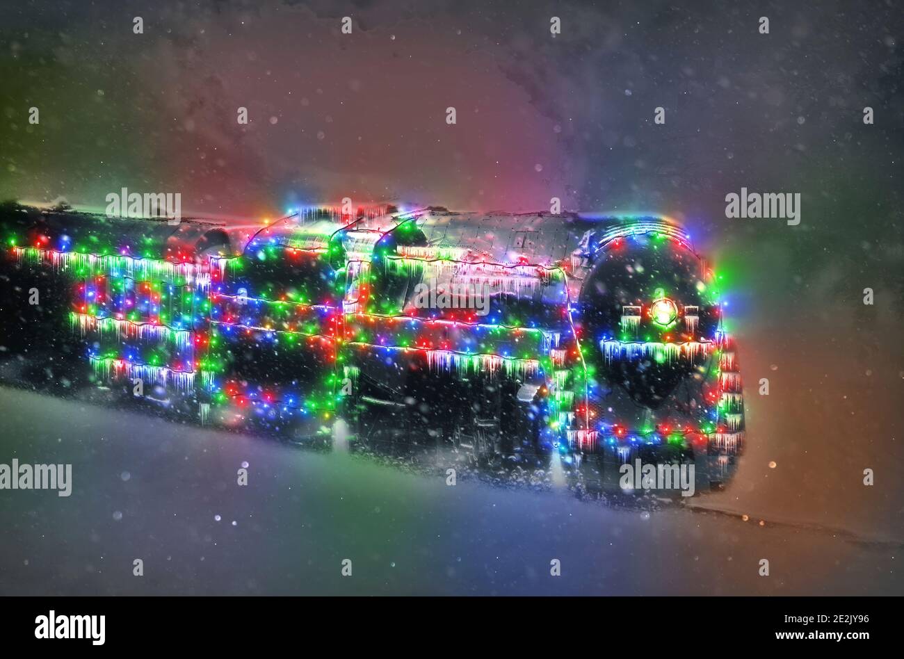 A Restored Steam Engine With Christmas Lights on it in a Snow Storm ...