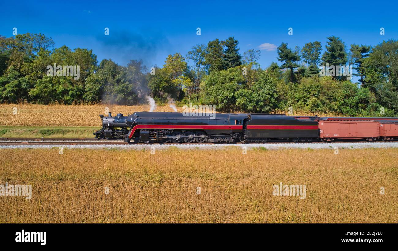 Aerial View of 2 Restored Antique Steam Engines and Passenger Cars ...