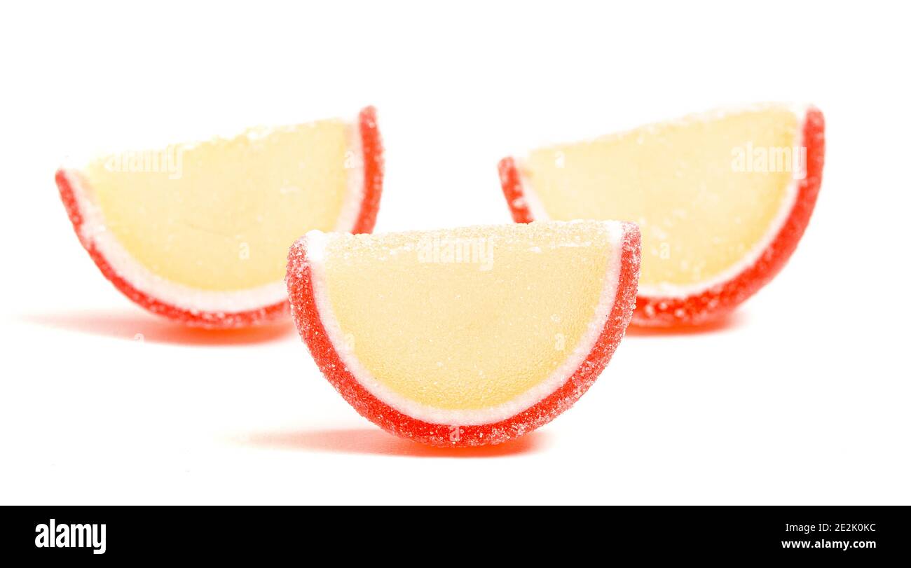 Red and Yellow Candy Fruit Slice Isolated on a White Background Stock ...