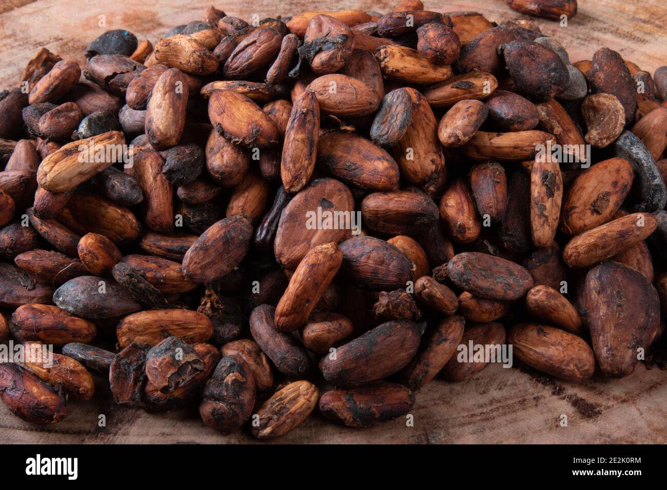 Aromatic raw cocoa beans stacked Stock Photo - Alamy