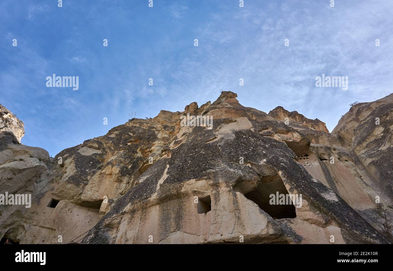 Ancient cave houses and rock formations near Goreme, Cappadocia, Turkey ...