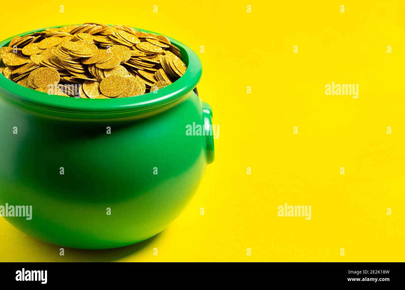 Green Pot Full of Golden Coins on a Bright Yellow Background Stock ...