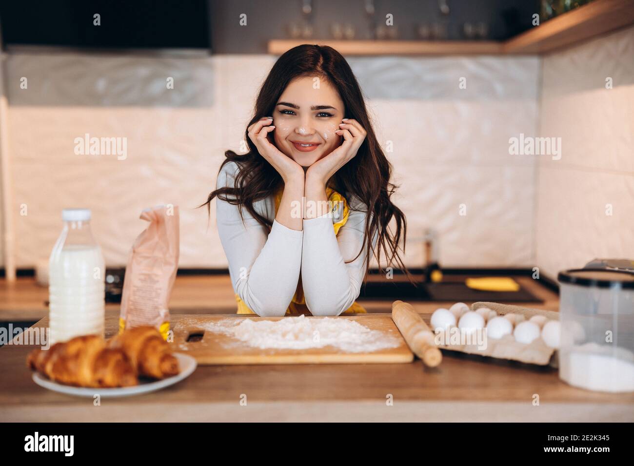 Pretty young woman making pie hi-res stock photography and images - Alamy