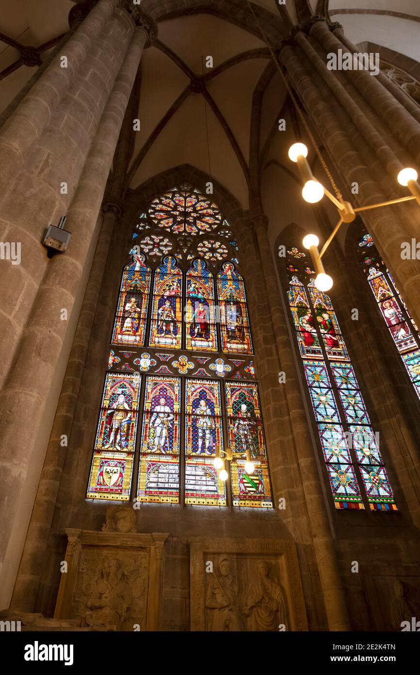 A stained glass window in the medieval gothic Church of Our Lady ...