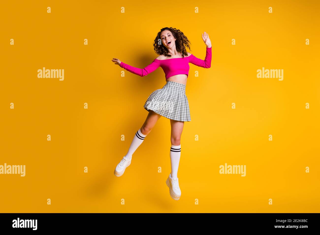 Photo Portrait Of Young Girl Jumping Up High Wearing Pink Crop Top 2849