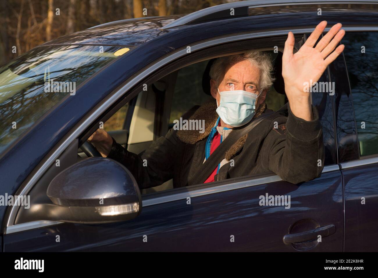 Old man waving goodbye hi-res stock photography and images - Alamy