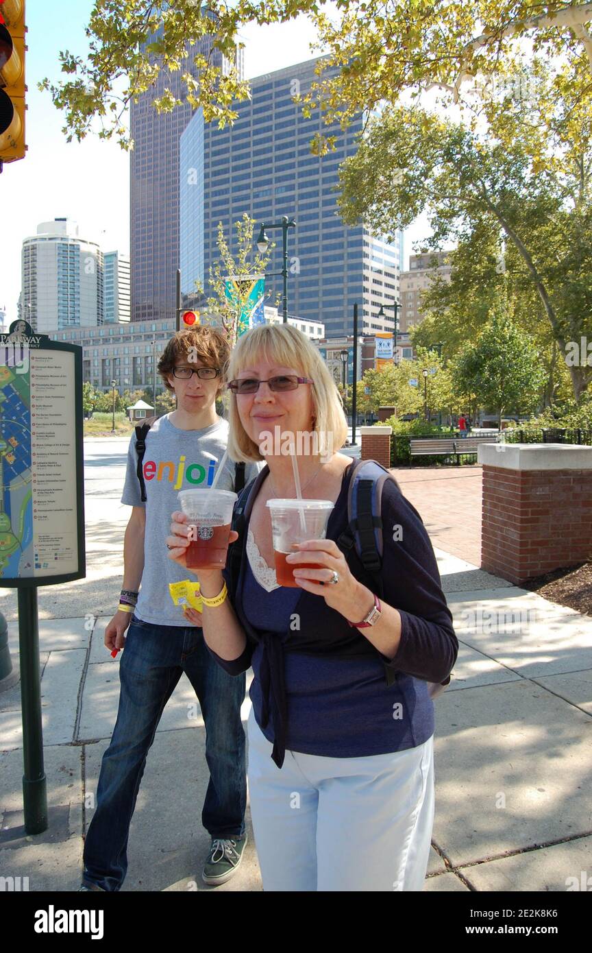 Walkers waiting for the bus with a cup of coffee in Philadelphia United ...