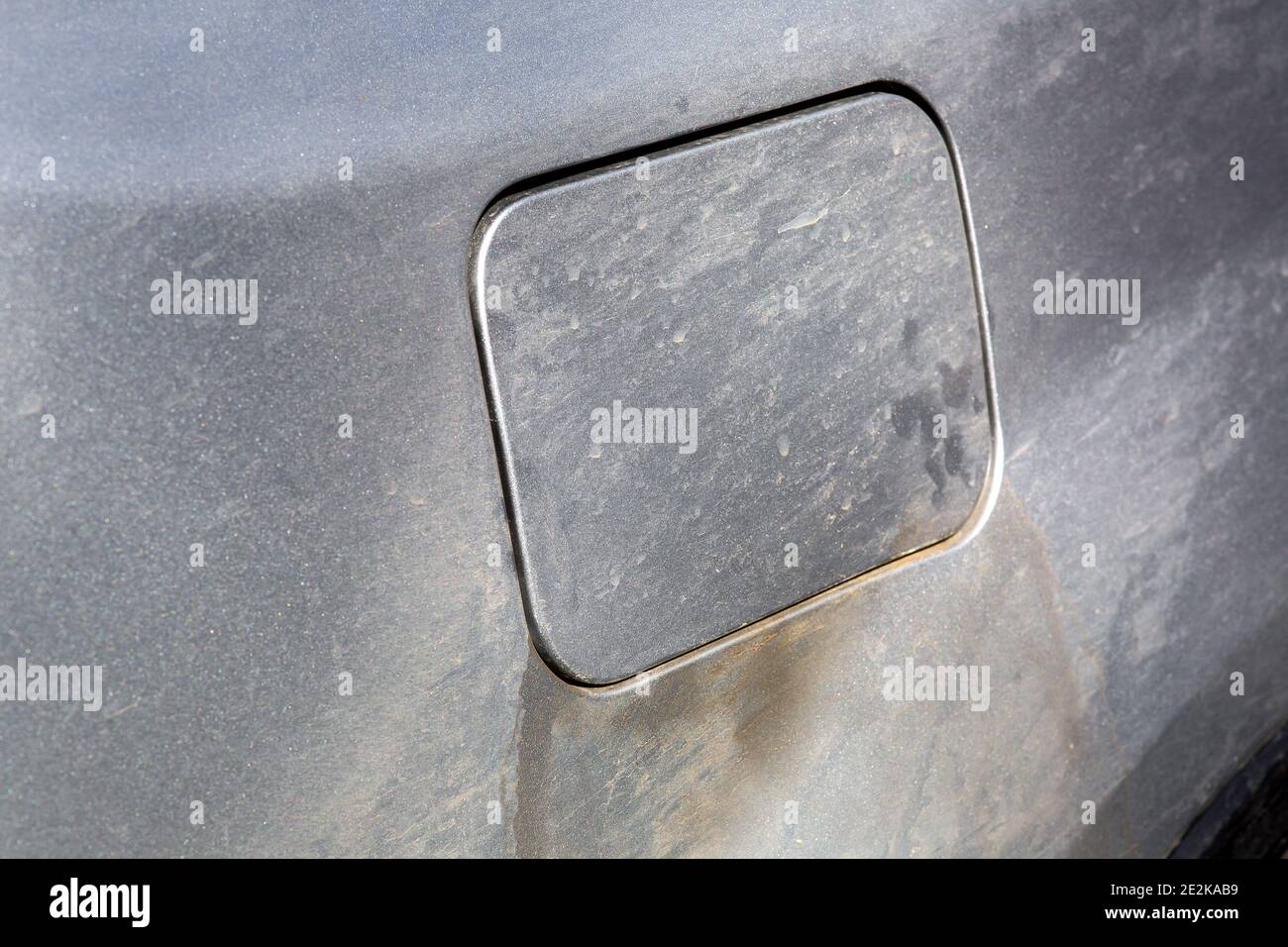 gray dirty car fuel cap close-up Stock Photo - Alamy