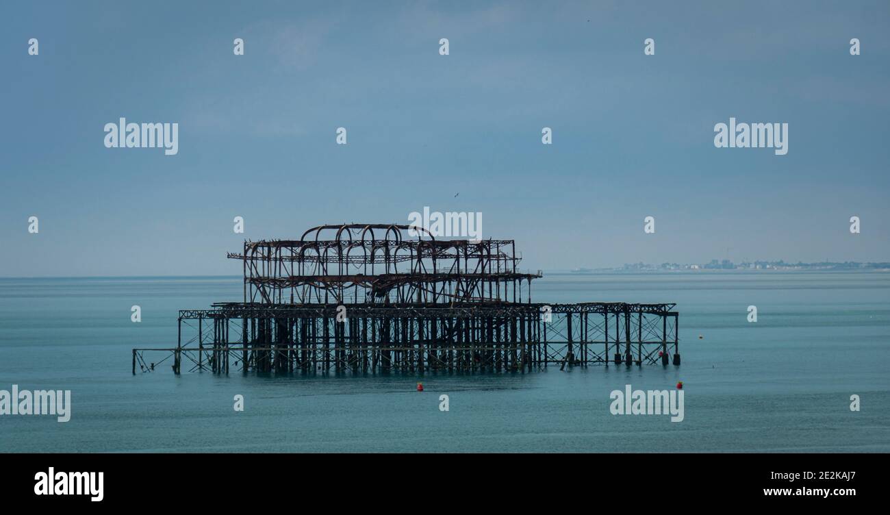 Burnt remains of the west pier at Brighton, East Sussex, UK Stock Photo ...