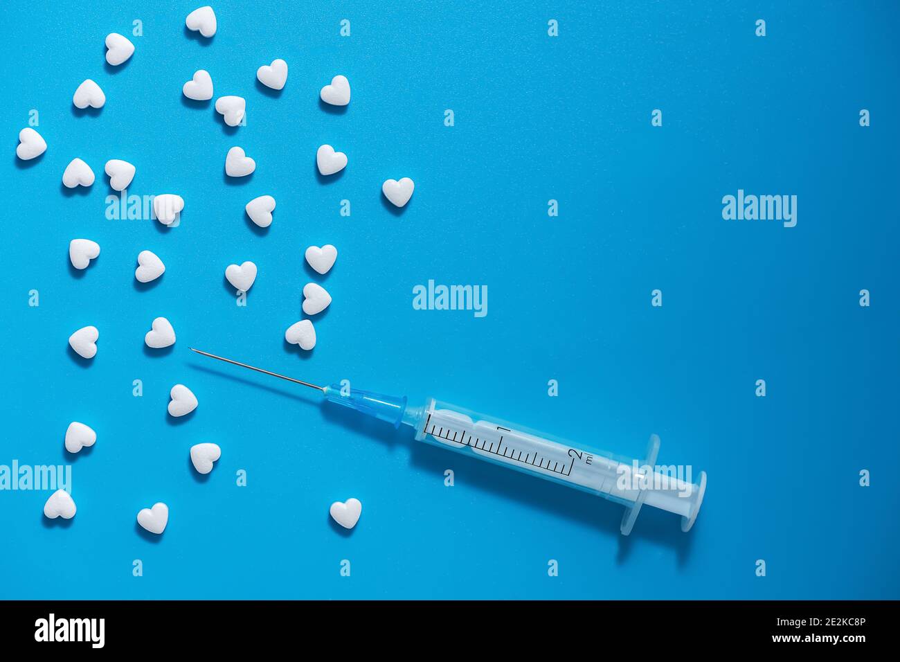 medical topic. Cardiology. heart-shaped tablets, syringe with copy ...