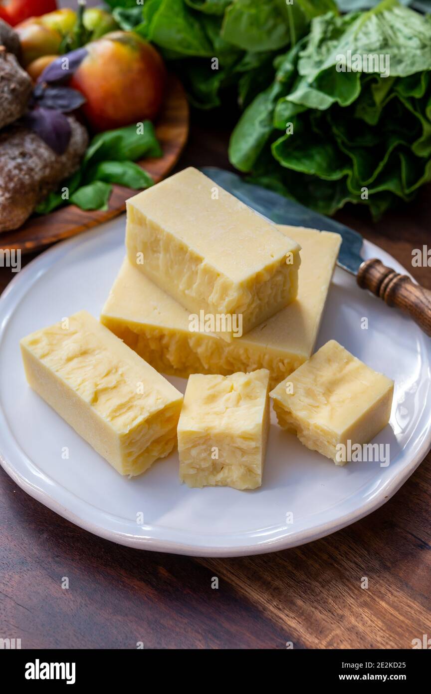 Cheese collection, pieces of aged British cheddar cheese close up Stock ...