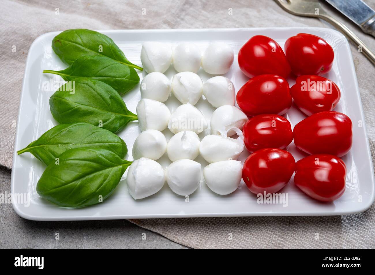 Italian food served as flag of Italy Tricolore with fresh fresh green ...