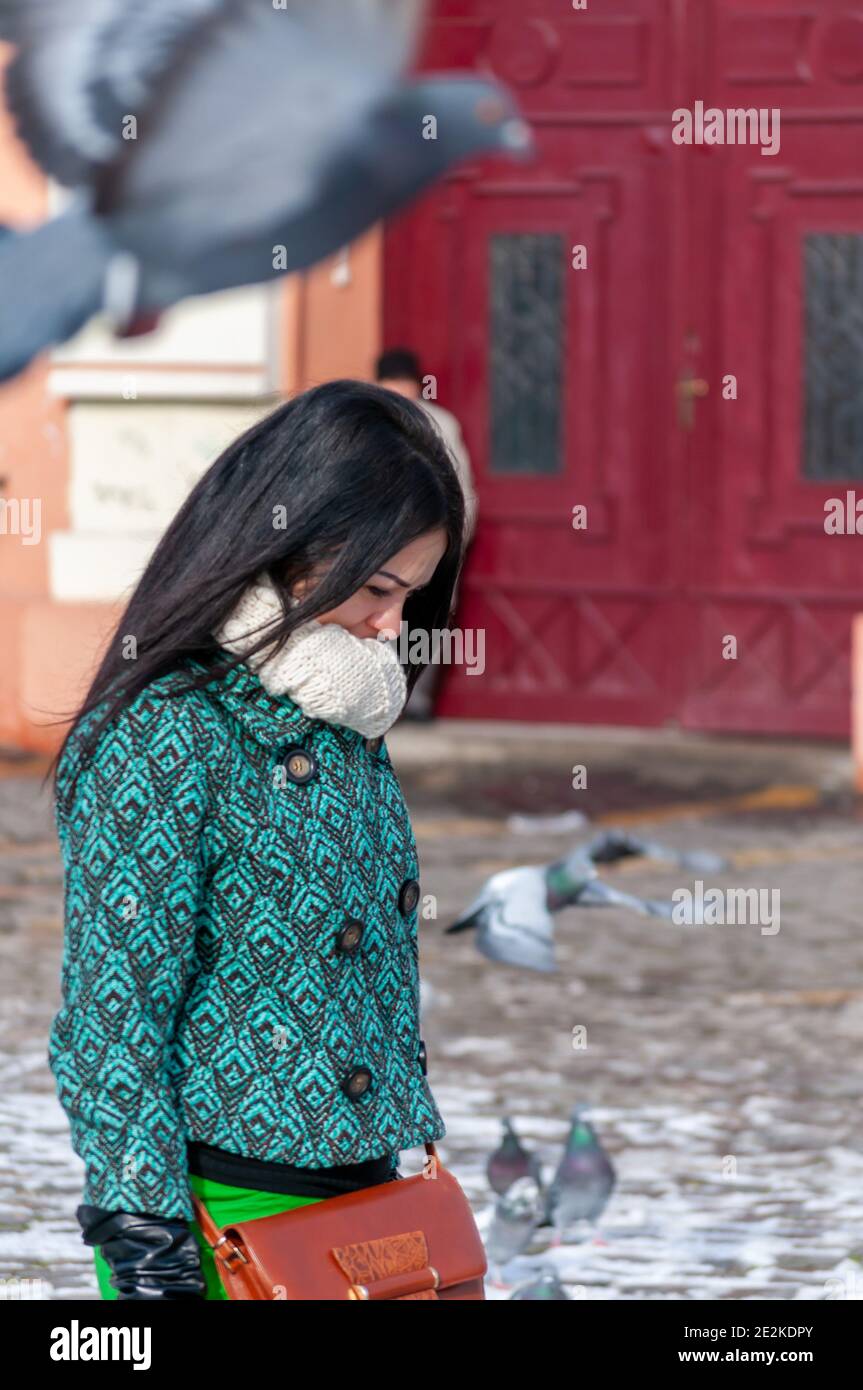Timisoara, Romania - January 30, 2014: Portrait of a girl walking on ...