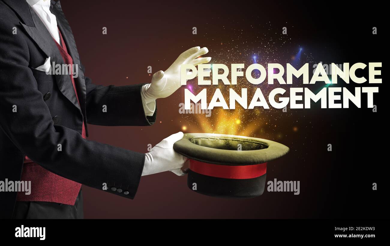 Illusionist is showing magic trick with PERFORMANCE MANAGEMENT ...