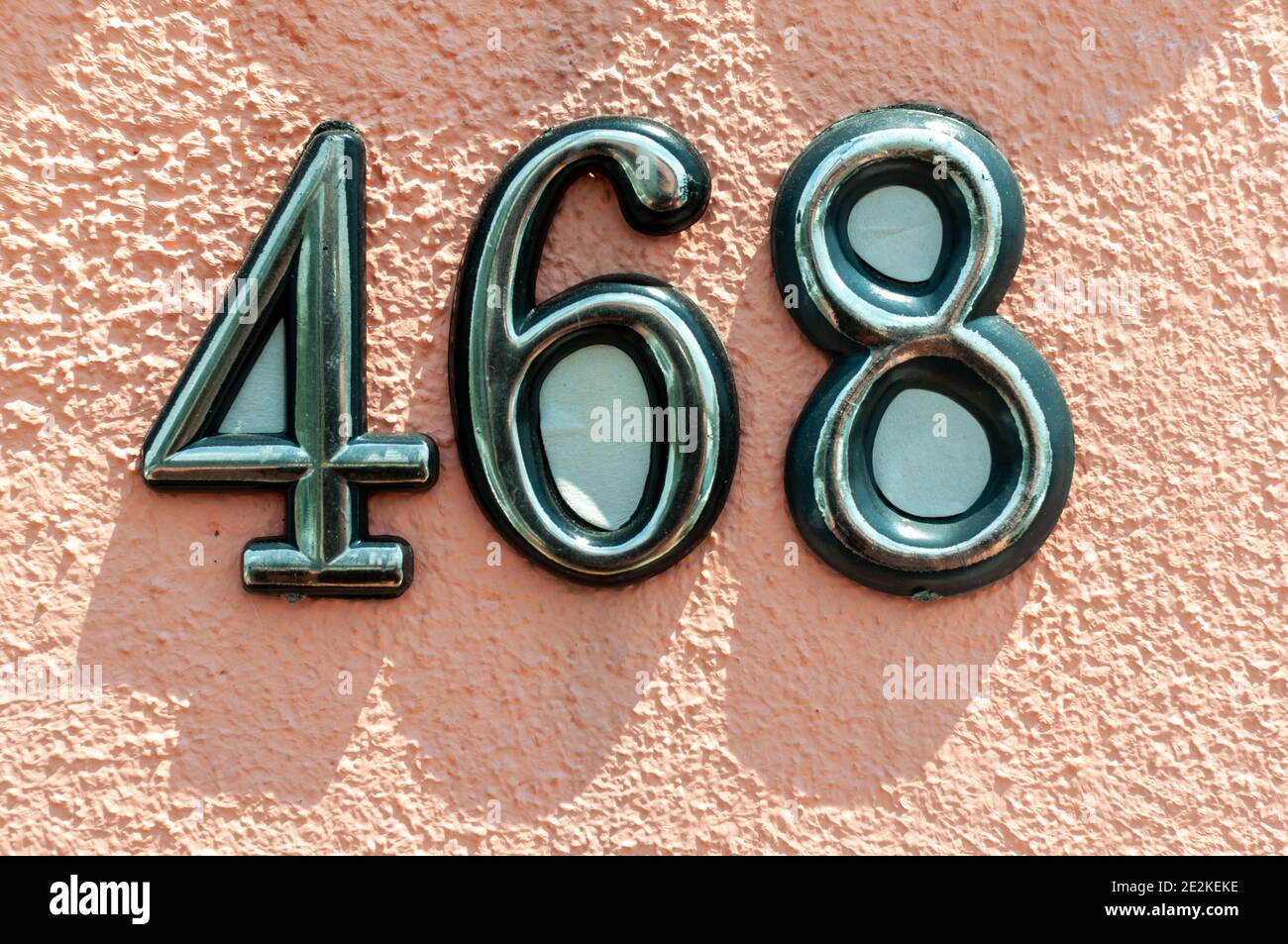 House number plate 468 on a wall. Street number. Address number Stock ...