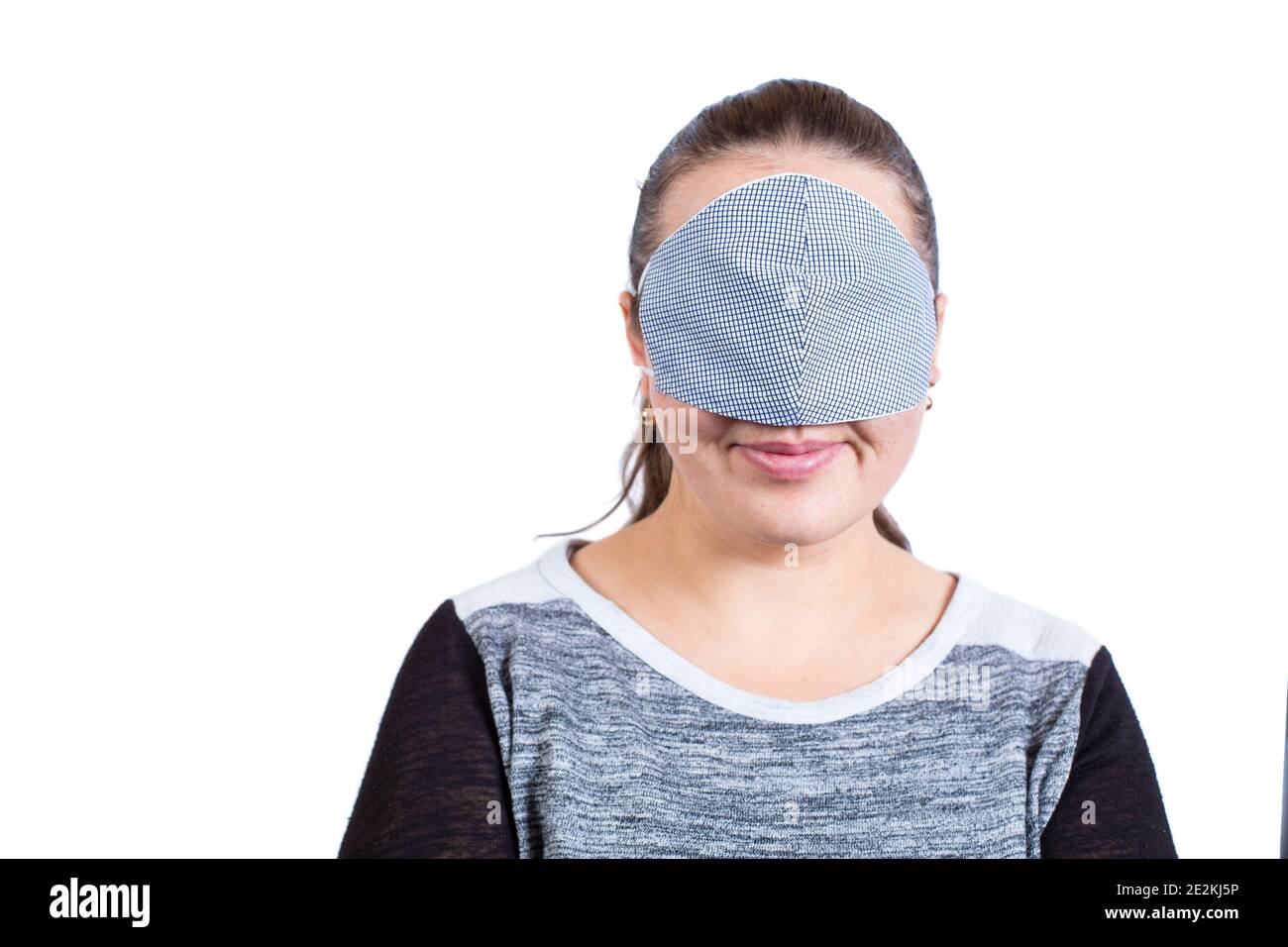 Young girl wear on mask on her eyes, like the way to ignoring ...