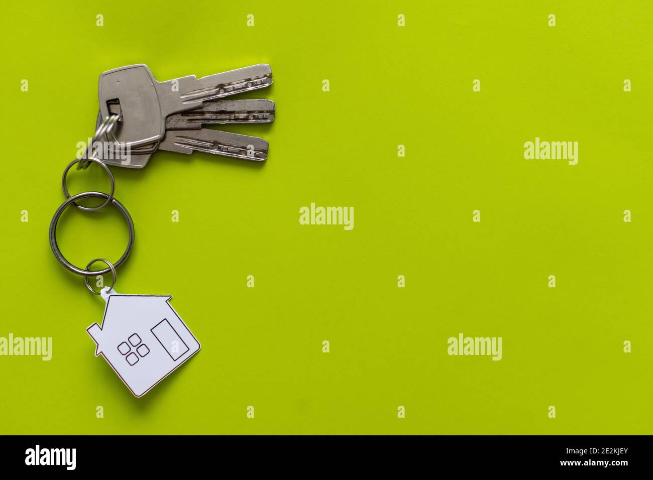 Set of Keys With White House Isolated on green Background Stock Photo ...