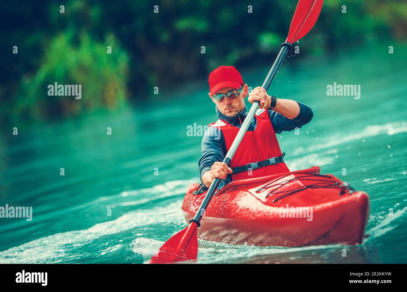 Paddling Caucasian Kayaker on the Scenic Lake Watersport and Recreation ...