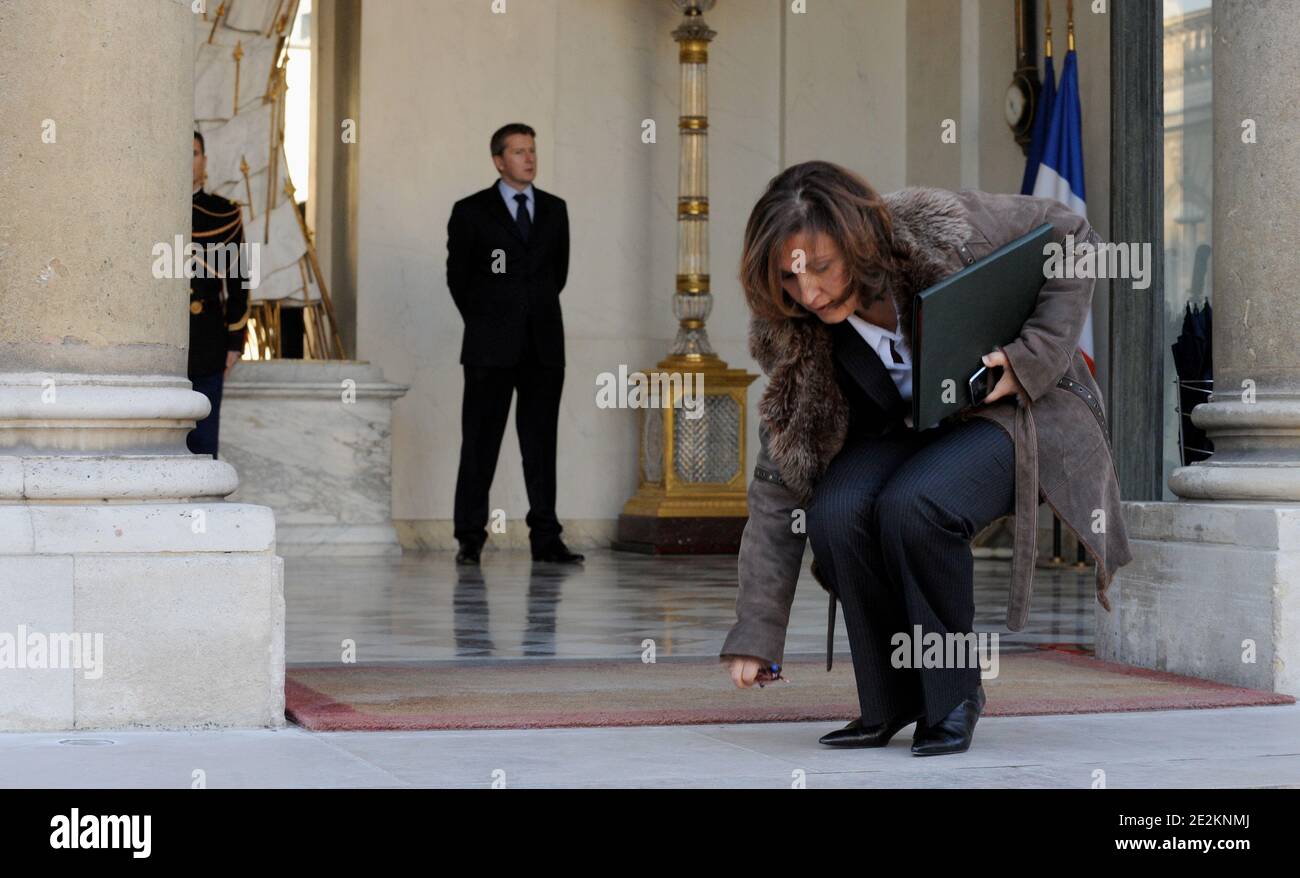 French Junior minister for the elderly Nora Berra collests her keys as ...