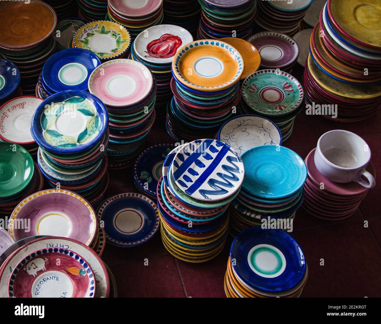 Stacks of painted ceramic plates in Vietri, Italy Stock Photo - Alamy