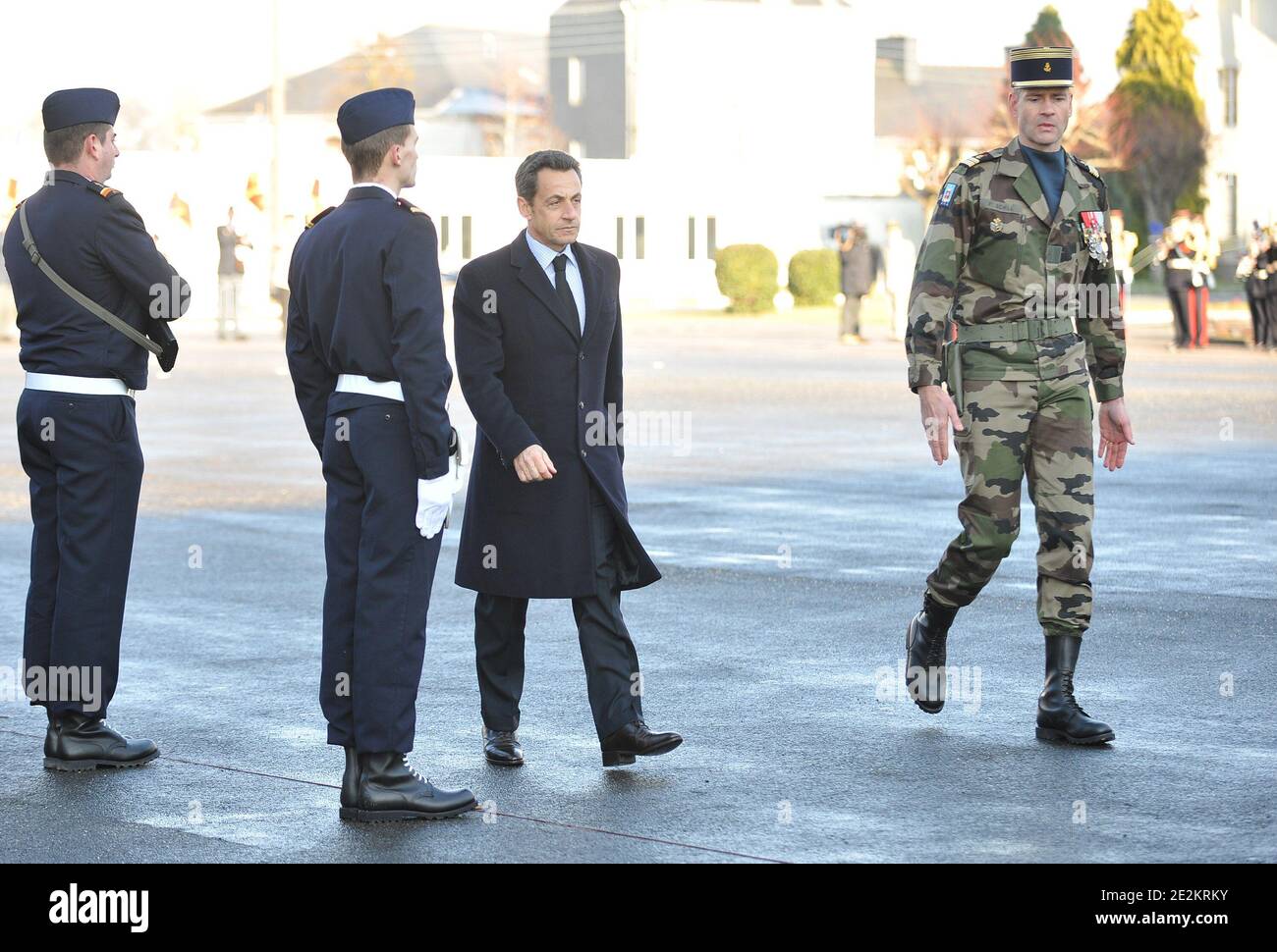 French President Nicolas Sarkozy Colonel Pierre Schill reviews troops ...