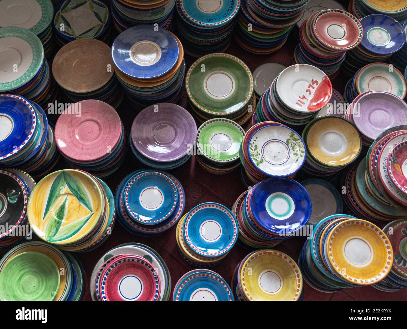 Stacks of painted ceramic plates in Vietri, Italy Stock Photo - Alamy