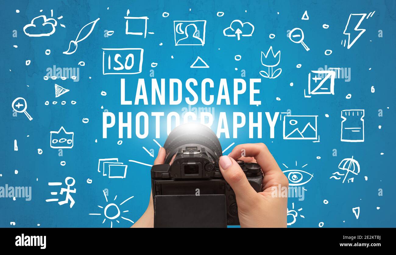 Hand taking picture with digital camera and LANDSCAPE PHOTOGRAPHY ...
