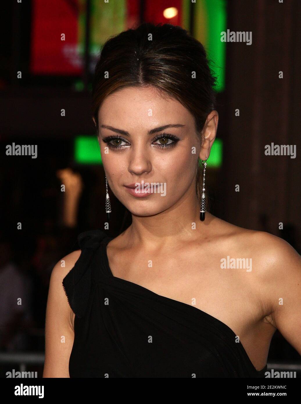 Mila Kunis arrives at The Los Angeles Premiere of The Book of Eli at ...