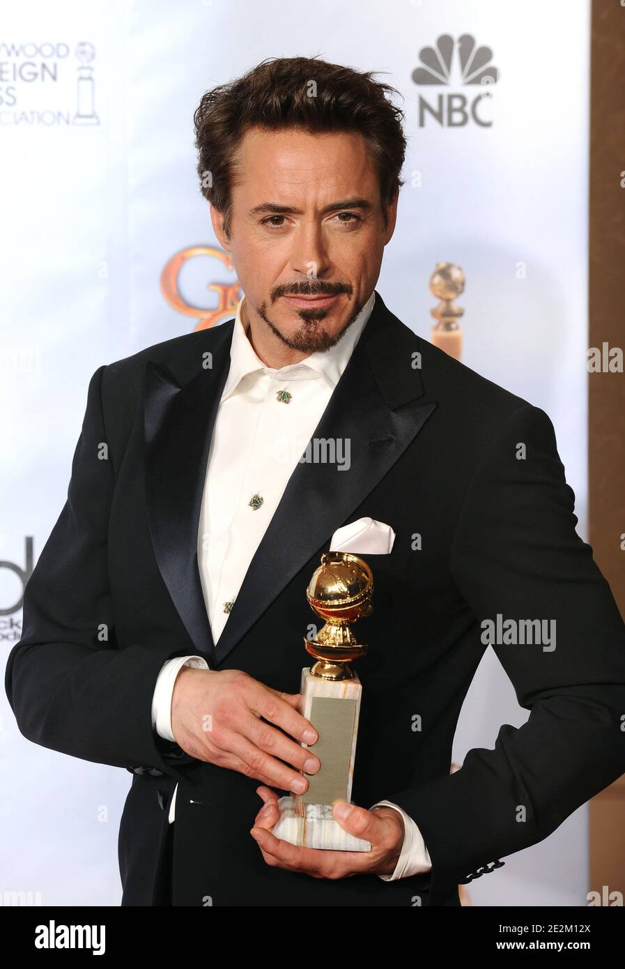 Robert Downey Jr. poses in the press room of the 67th Golden Globe ...