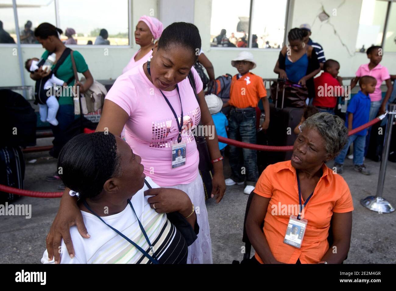 Haitians wait at the airport to flight outside in Port-au-Prince Haiti ...