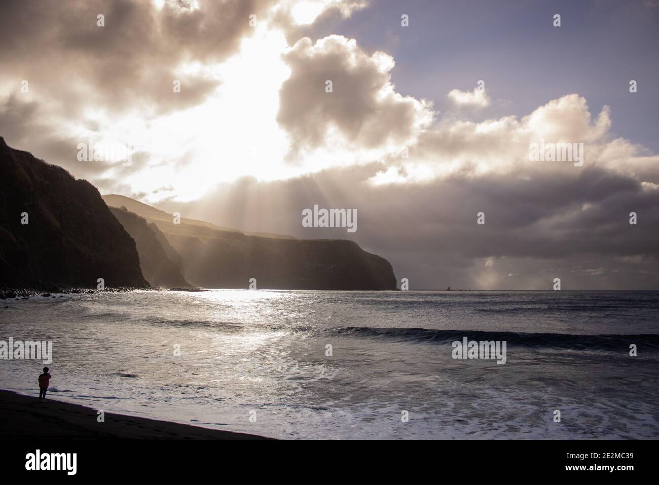 Person alone, sunset at Mosteiros beach, São Miguel island - Azores ...