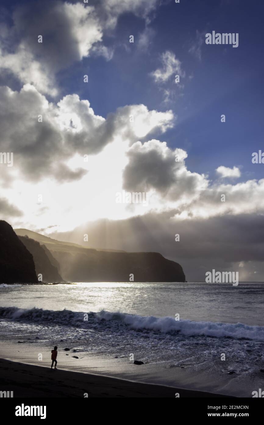 One person alone, sunset at Mosteiros beach, São Miguel island - Azores ...