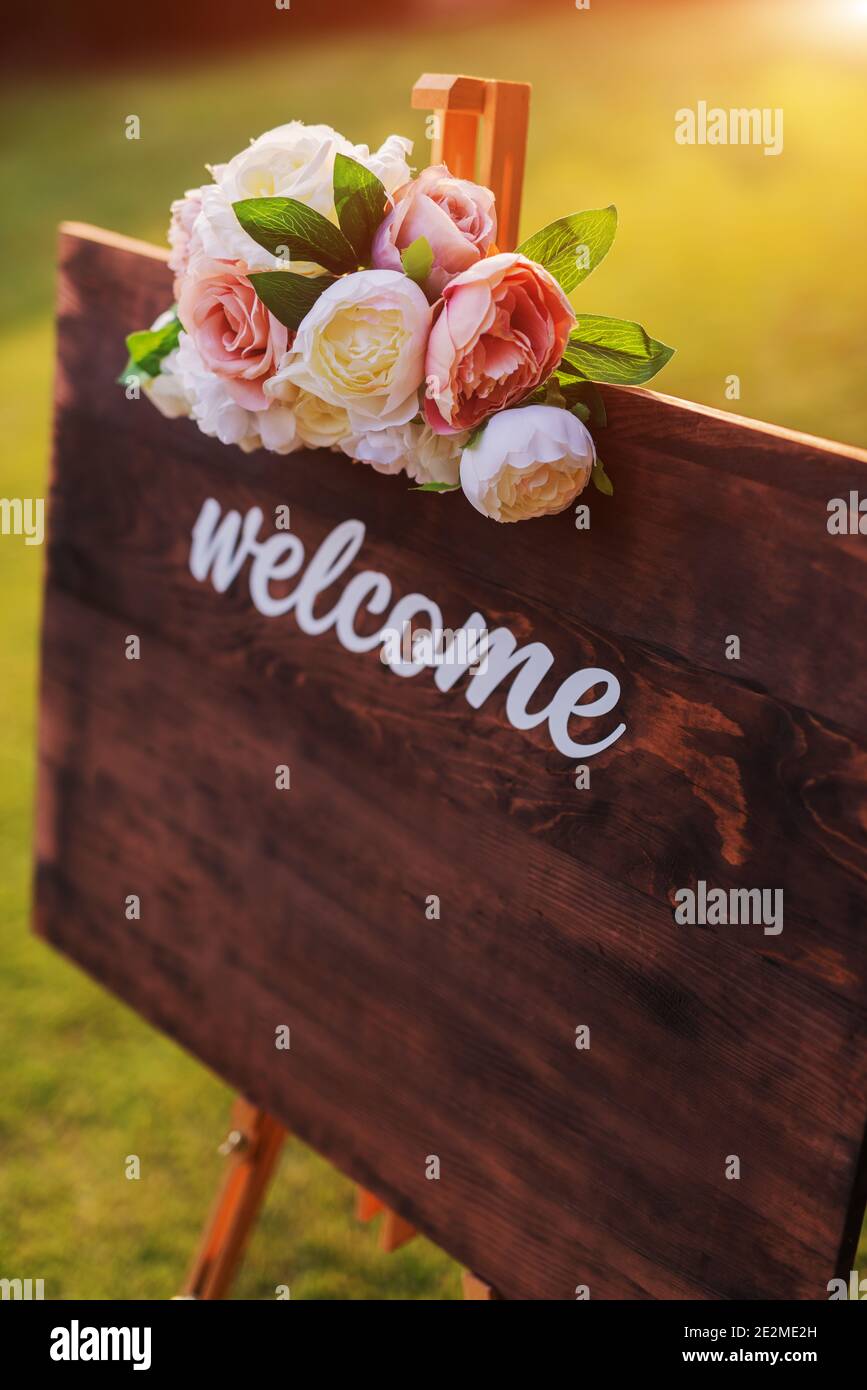 Wooden board with welcome sign. Celebration can start Stock Photo - Alamy