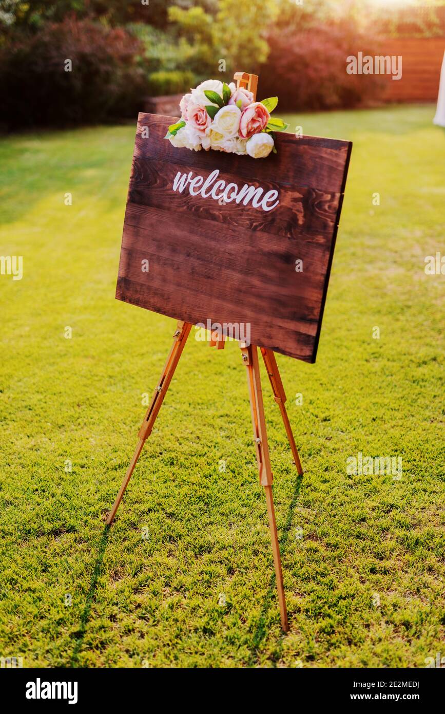 Wooden board with welcome sign. Celebration can start Stock Photo - Alamy