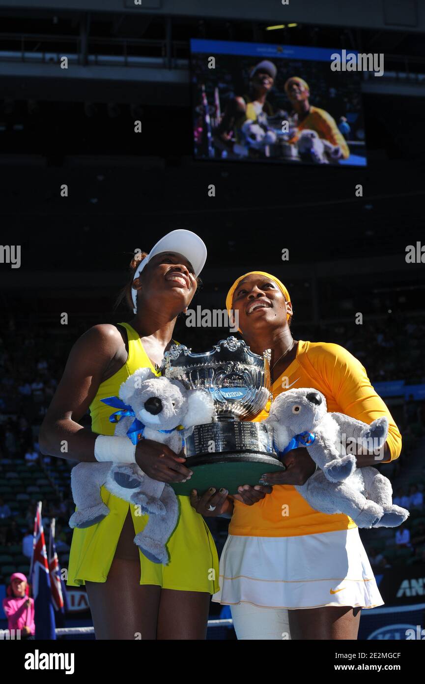 Venus williams and serena williams with the womens doubles trophy hi ...