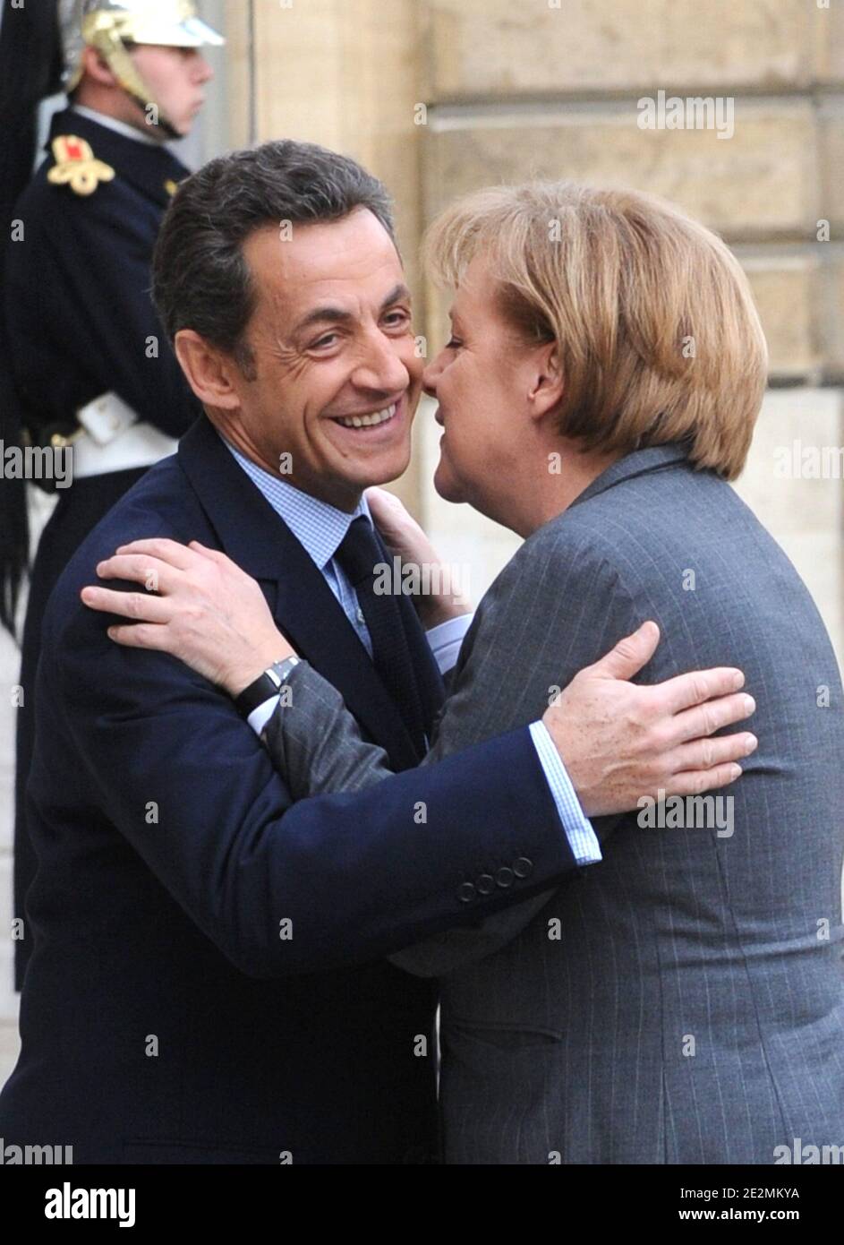 French President Nicolas Sarkozy receives German Chancellor Angela ...