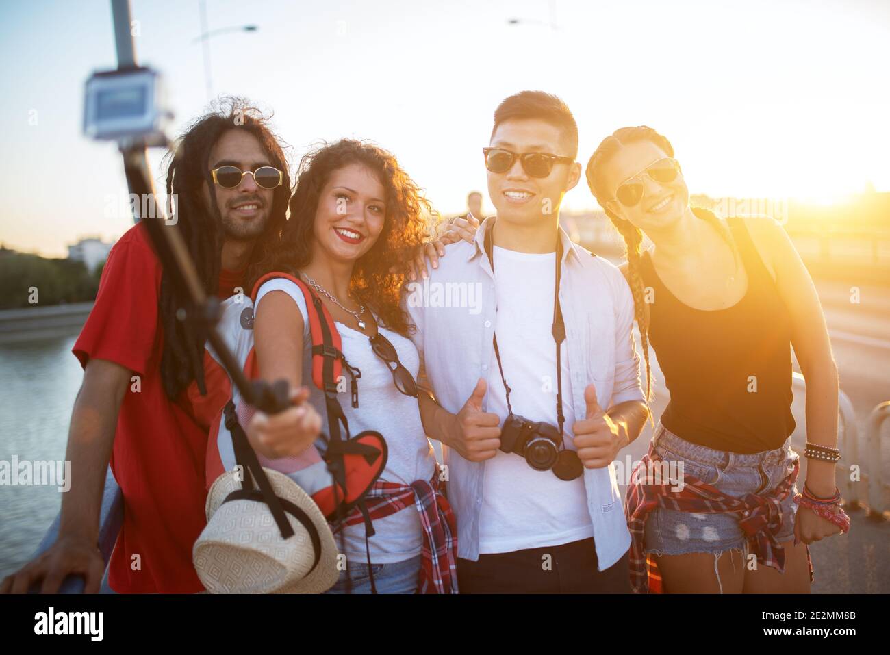Group of young multicultural beautiful student tourist taking picture ...