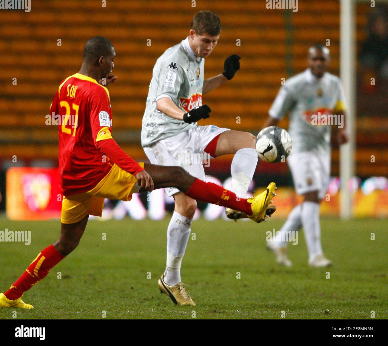 Lens' Samba Sow fights for the ball with Le Mans' Guillaume Loriot ...