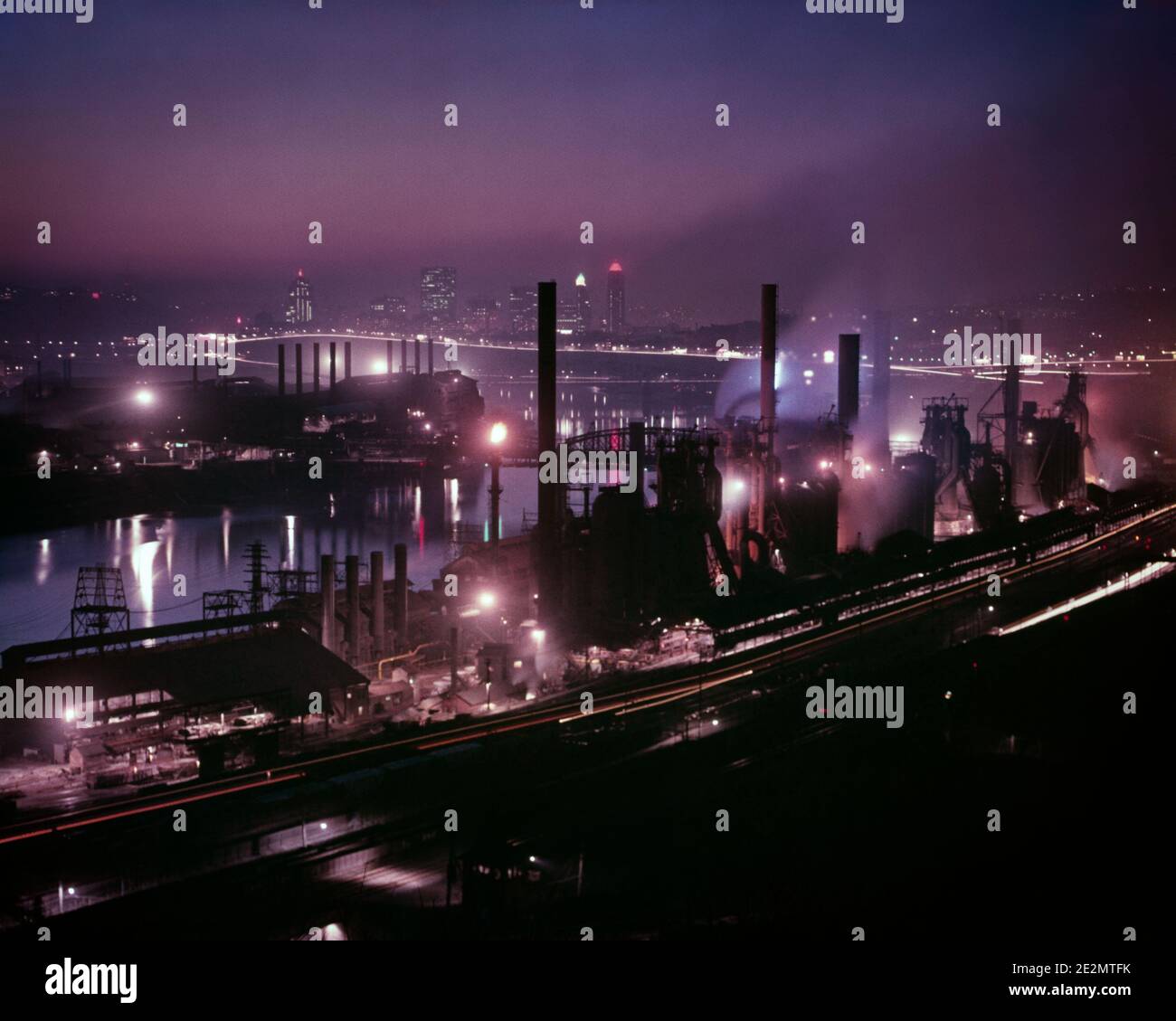 1950s 1960s JONES AND LAUGHLIN STEEL MILL SEEN AT NIGHT ALONG THE ...