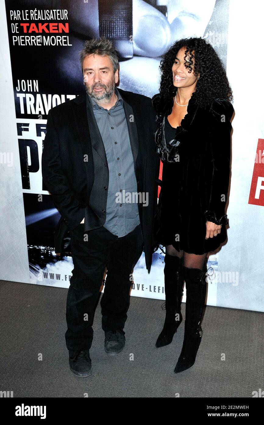 Luc Besson and his wife arriving at the French Premiere of the movie ...