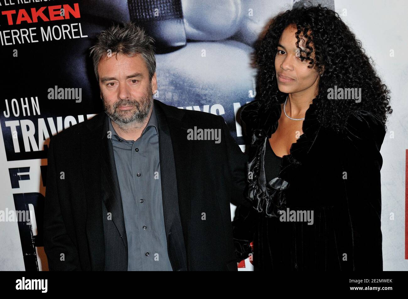 Luc Besson and his wife arriving at the French Premiere of the movie ...